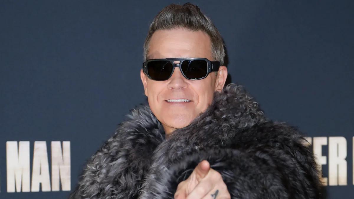Robbie Williams confesó su entusiasmo por reunirse con sus ex ...